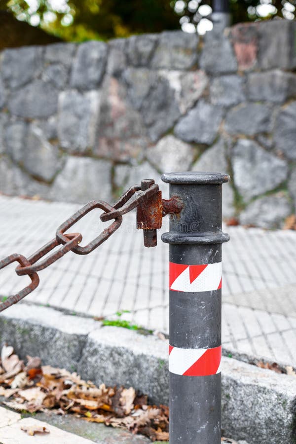 Closed Rusty Chain Barrier of Private Parking on City Road Stock Image ...