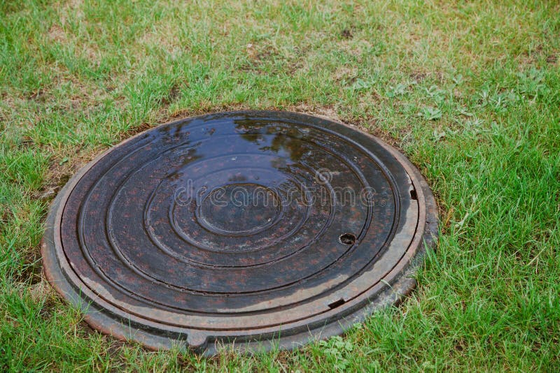 Closed sewer well stock image. Image of metal, light - 124357093