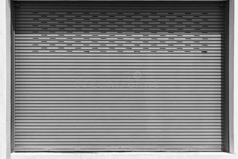 Silver Metal Roller Shutter Doors on the Ground Floor of the House ...