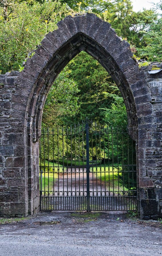 Closed Stone Arched Gate To Driveway Stock Photo - Image of gate ...