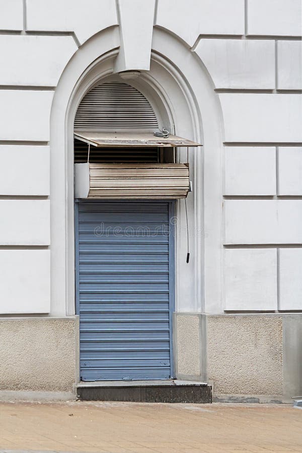 Closed store front door stock image. Image of roll, roller - 323182901