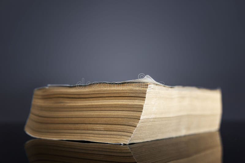 Closed Thick Book. a Stack of Pages on a Black Background Stock Photo ...