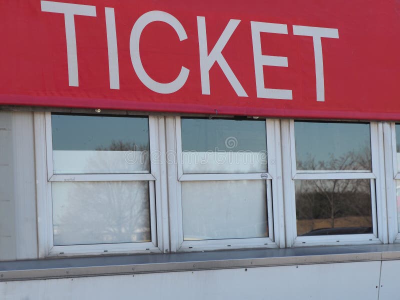 Closed Ticket Box Office Windows Under Big Red Sign Stock Image - Image ...