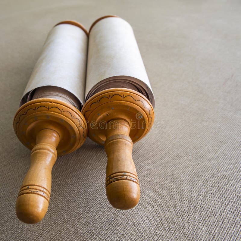 The Torah Scroll from Papyrus and Wood on a Wooden Table of Brown Color ...