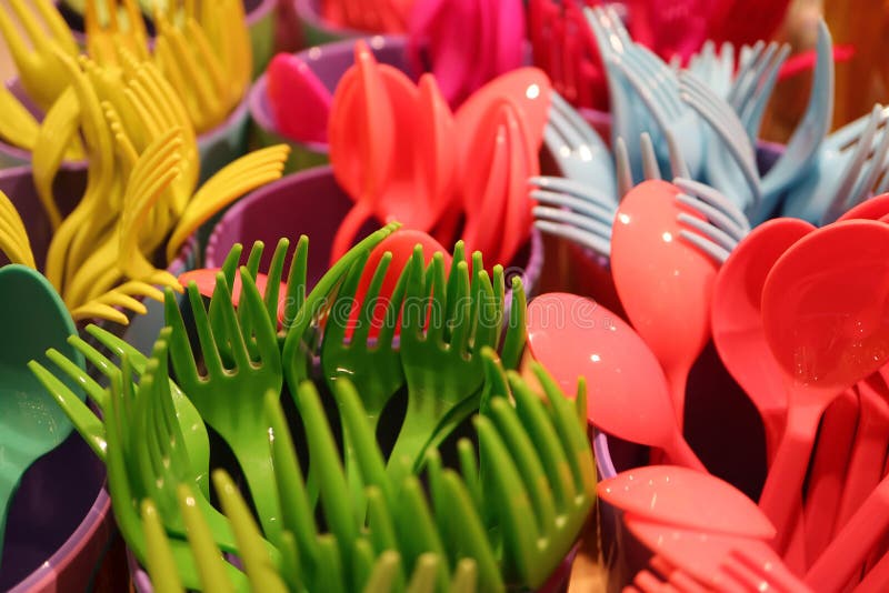 Closed Up Bunch of Multi-color Plastic Ware Cutlery with Selective ...