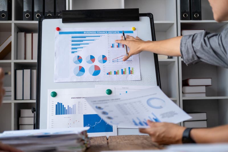 Closed Up a Business Man Present and Point at Chart of Figure Summary ...