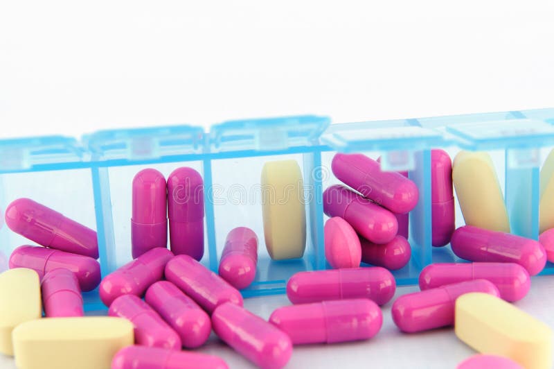 Closed Up Capsule and Tablet in daily Pill Box Stock Image - Image of ...