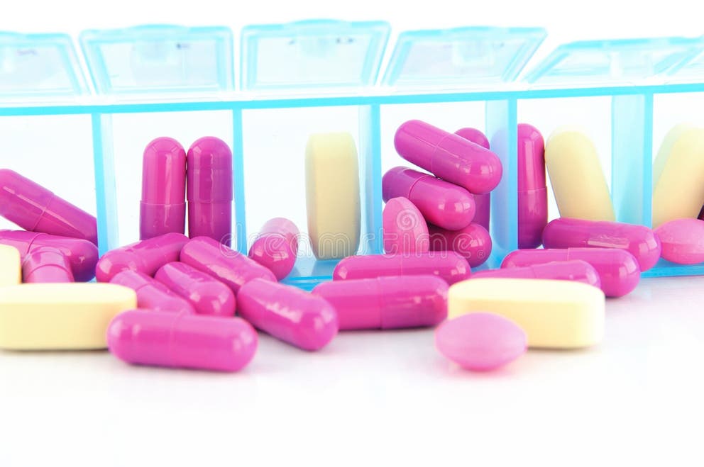 Closed Up Capsule and Tablets in daily Pill Box Stock Image - Image of ...