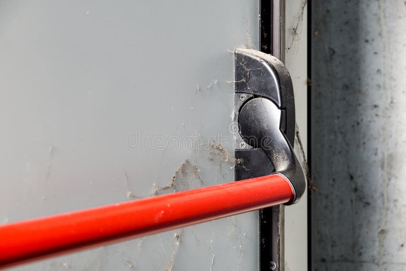 Closed Up Latch and Door Handle of Emergency Exit. Push Bar and Rail ...