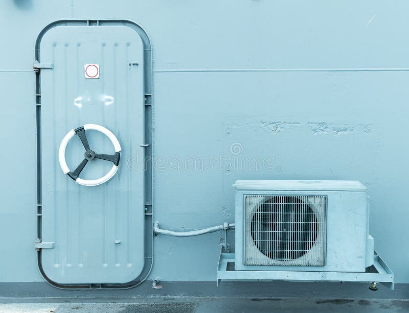 Closed Watertight Door with Outdoor Air Compressor Stock Photo - Image ...