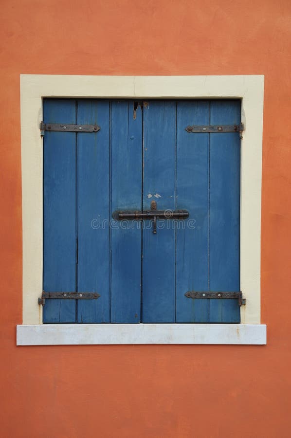 Window with Blue Shutter on Orange Wall Stock Image - Image of paint ...
