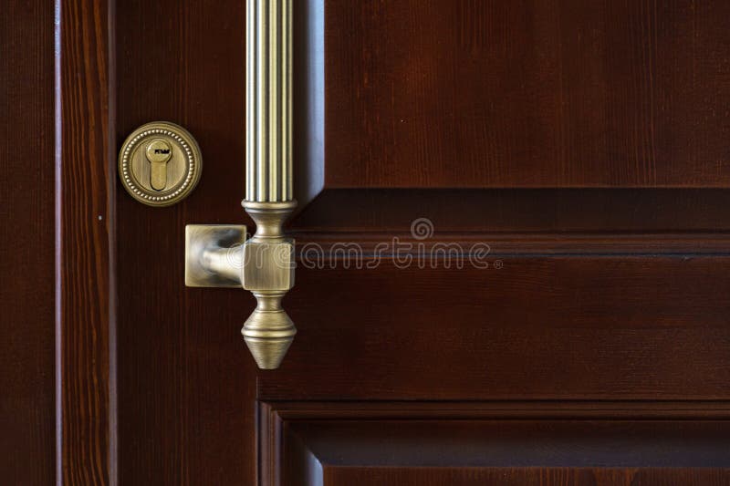 A Closed Wooden Door Inside. Interior Design, Dark Red Door with Metal ...