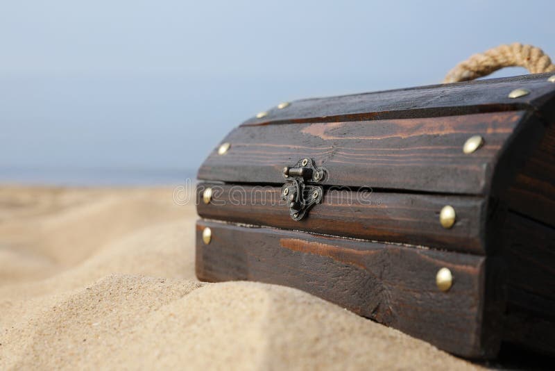 Closed Wooden Treasure Chest on Sandy Beach Stock Photo - Image of ...
