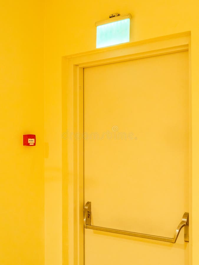 Closed Yellow Emergency Fire Exit in Building Stock Photo - Image of ...