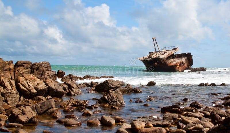 ClosedAghullas Shipwreck Lying on the Rocks Stock Image - Image of ...