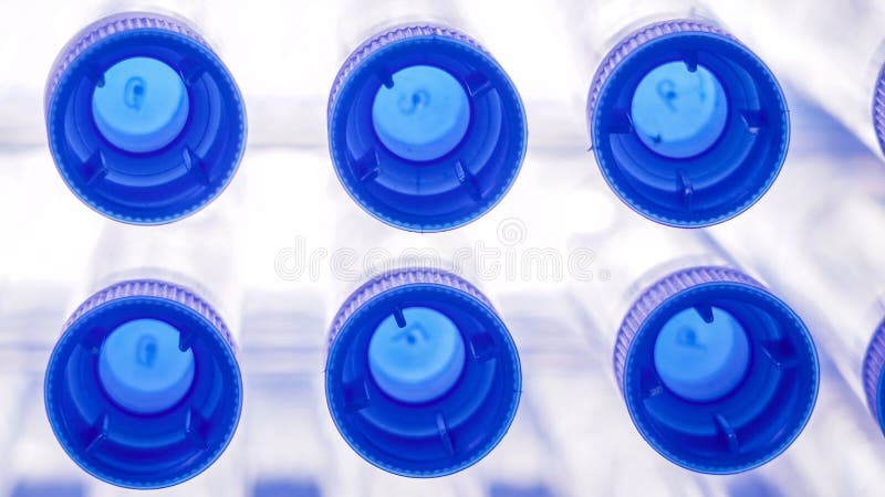 27934_Closer_look_of_the_blue_caps_of_the_tubes_ Stock Photo - Image of ...