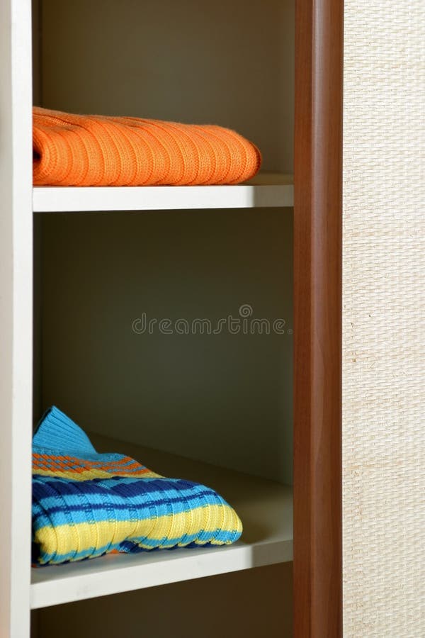 Closet stock image. Image of arranged, orange, open, sweater - 11103957