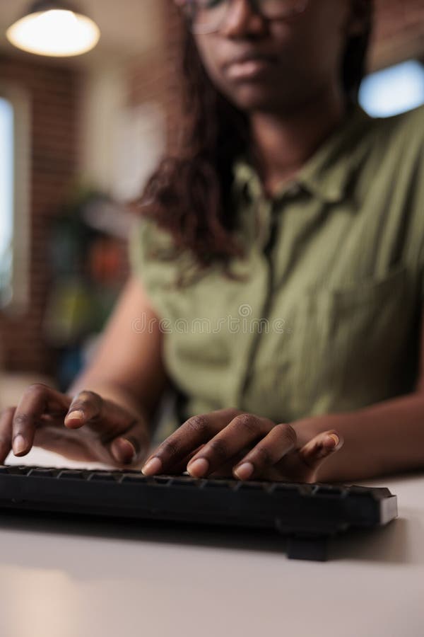 Closeup of African American Woman Programmer Writing Code on Computer ... Closeup of African American Woman Programmer Writing Code on Computer ...