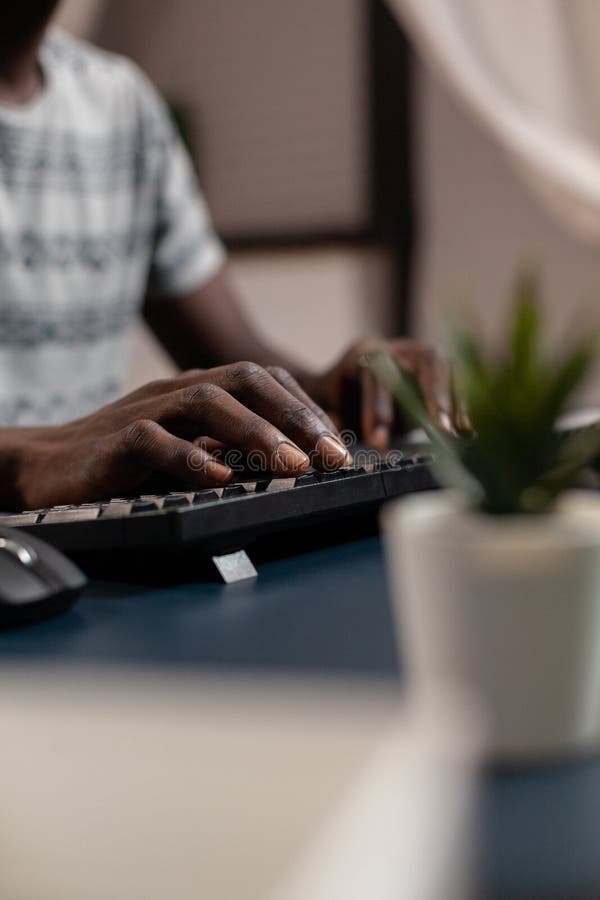 Closeup of African American Young Businessman Hand Typing Communication ...