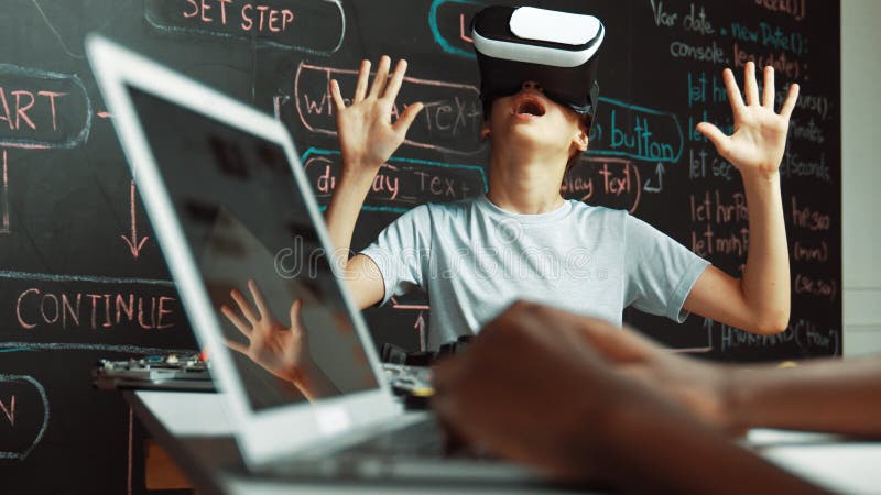 Closeup of African Student Hands Programing System at Blackboard ...