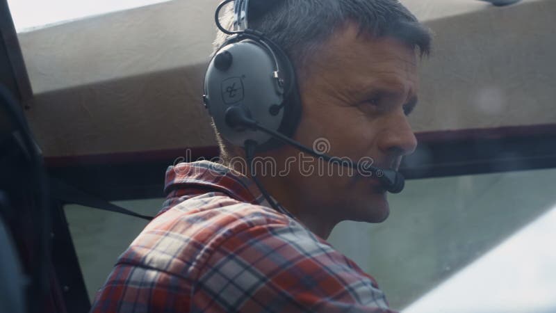 Closeup Airplane Pilot Face Wearing Headset with Microphone Sitting ...