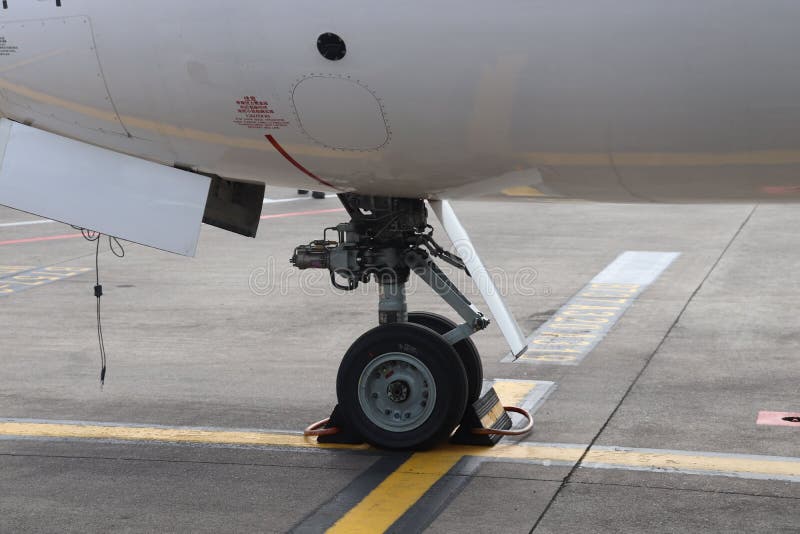 Closeup of an Airplane Wheel on the Runway Stock Image - Image of ...