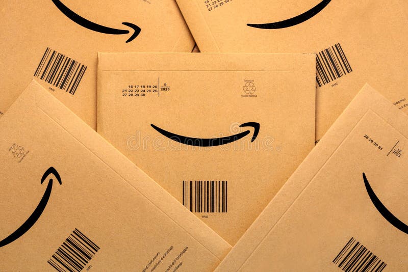 Closeup of Amazon Prime Cardboard Boxes and Amazon Logo. Illustrative ...