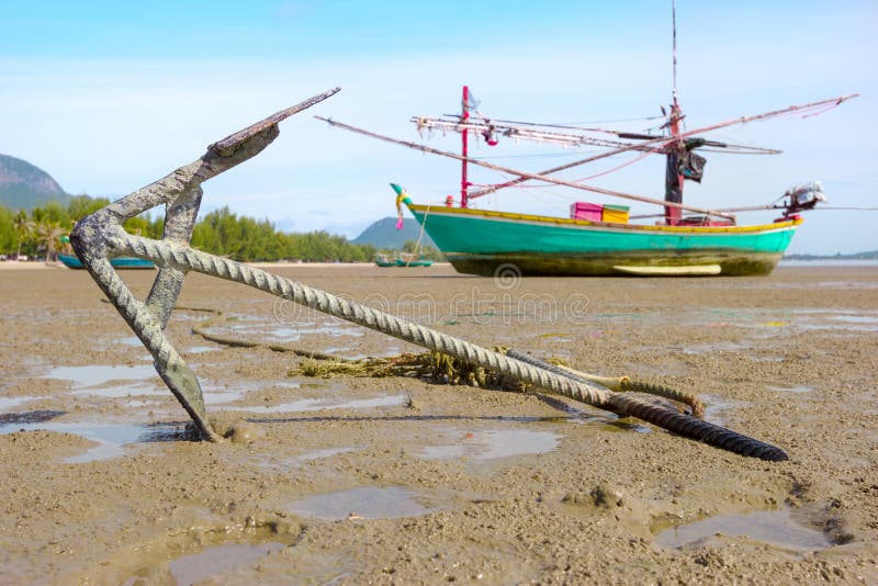 Closeup Anchor with Fishing Boat on the Coast Stock Image - Image of ...