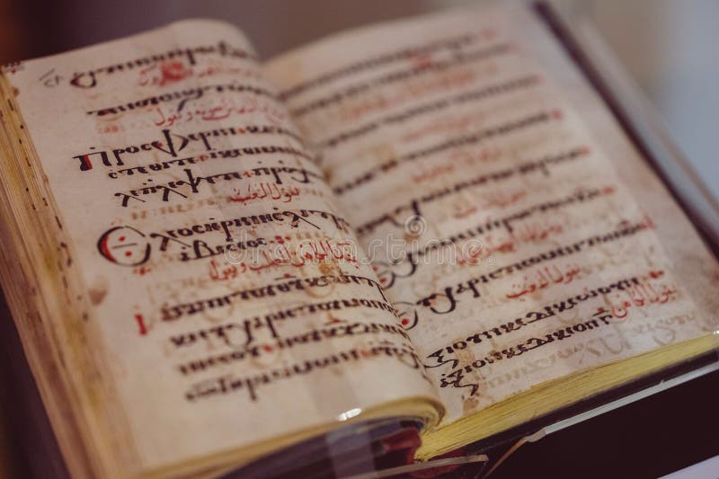 Closeup of Ancient Christian Bible, Written in Arabic with a Blurry ...