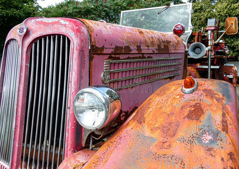 Closeup of an Antique Rusty Fire Engine Truck Transport on the Streets ...