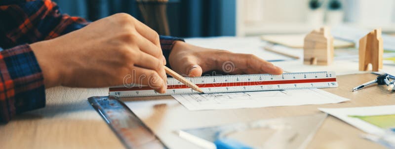Closeup of Architect Engineer Hand Using Ruler Draw a Blueprint ...