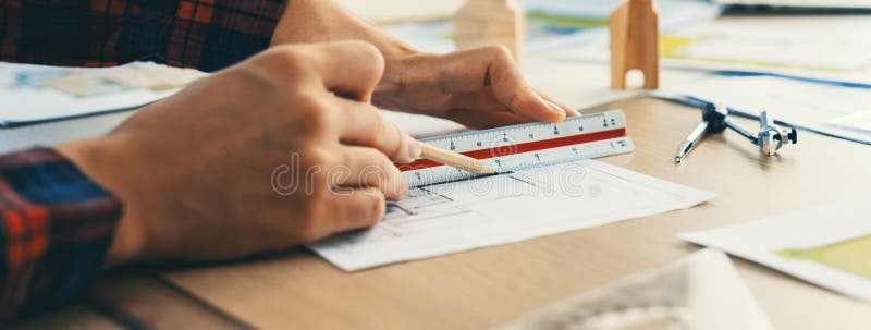 Closeup of Architect Engineer Hand Using Ruler Draw a Blueprint ...
