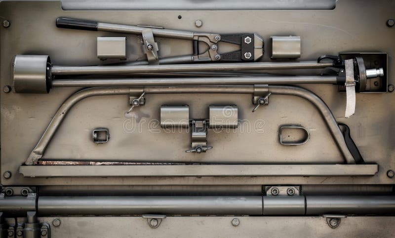 Closeup of Armored Military Vehicle. Detail of Different Work Tools on ...