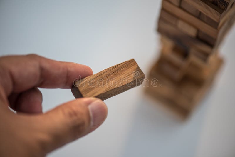 Closeup of Asian Woman`s Hand Playing Wood Blocks Stack Game Stock ...