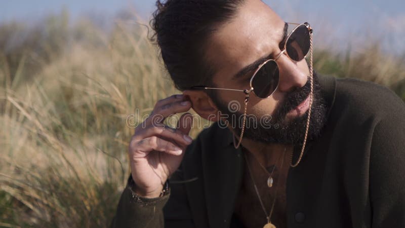 Closeup of an Attractive Middle Eastern Man with a Beard on a Beach on ...