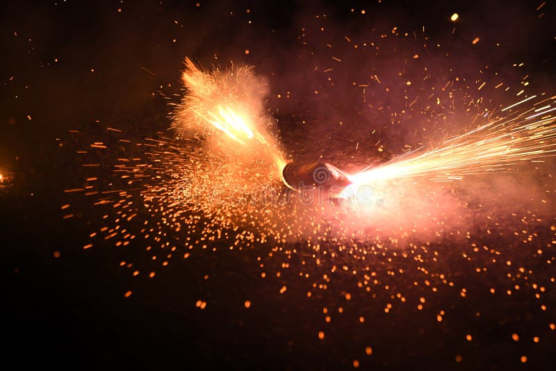 A Closeup of an Awesome Firework As it Explodes and Streams Sparks ...