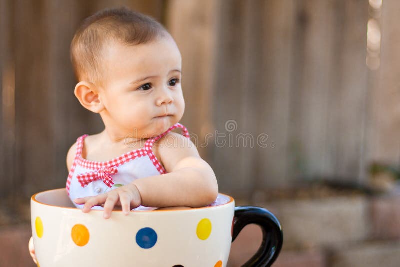 Happy and Cute Baby Girl in Giant Teacup Stock Photo - Image of months ...