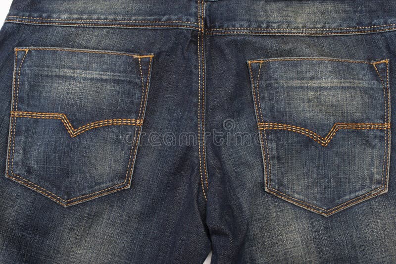 Closeup of Back Side of Pair of Dark Blue Washed Mens Jeans on Pure ...