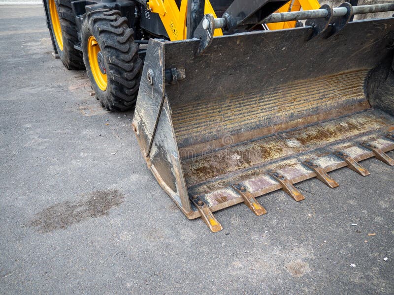 Closeup of a Backhoe Loader Outside on a Sunny Day Stock Photo - Image ...