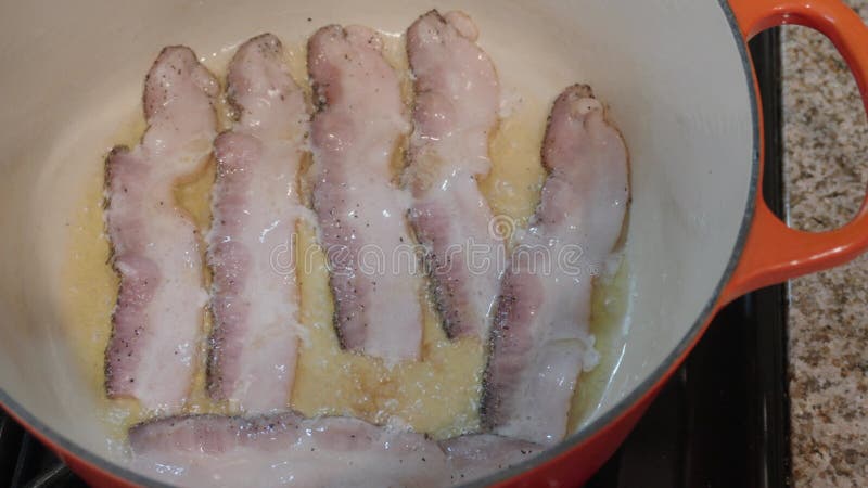 Closeup of Bacon Slices Getting Cooked in a Pot on the Stove Stock ...