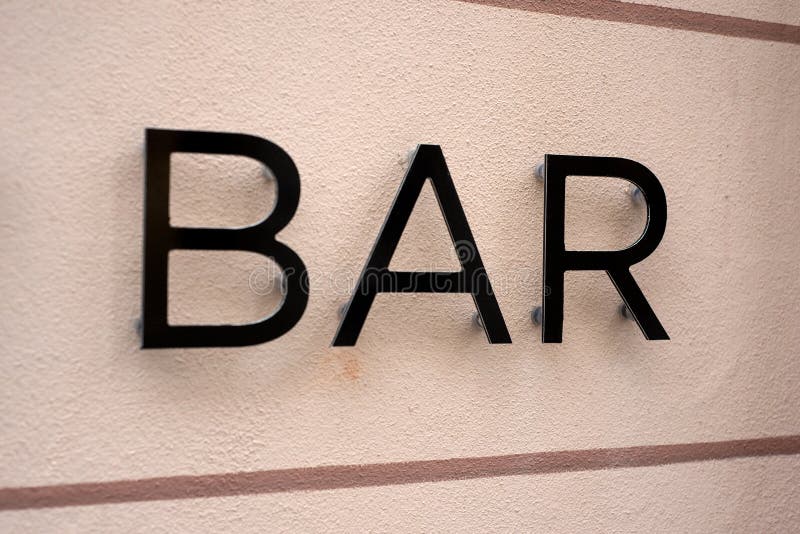 Bar Signage on the Wall in the Street Stock Image - Image of lettering ...