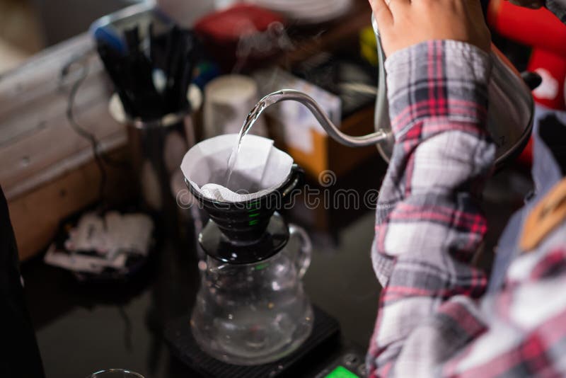 Closeup Barista Pour Water into a Cup. Stock Photo - Image of ...