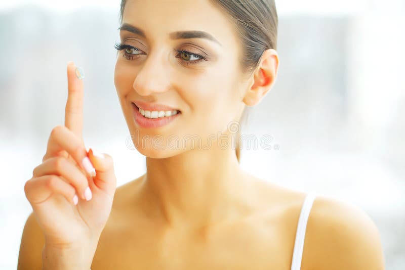 Closeup of Beautiful Woman Applying Eye Lens in Eye Stock Image - Image ...