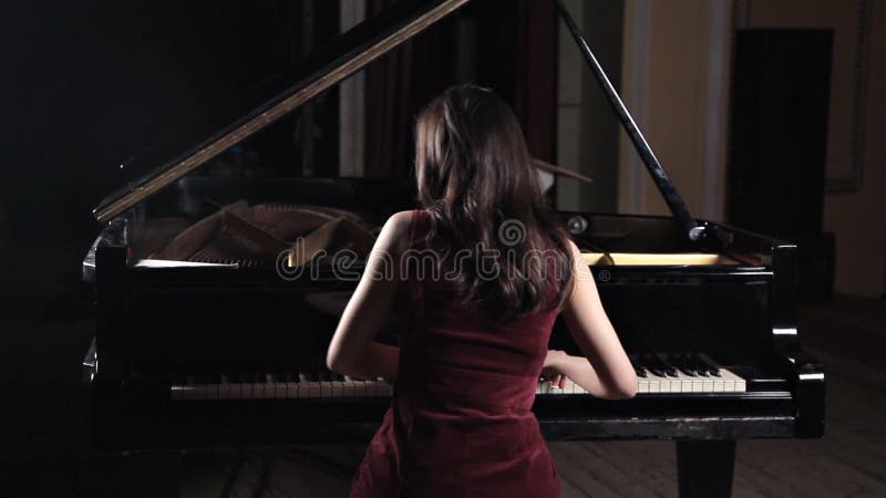 Closeup of Beautiful Woman Playing the Piano from the Back View Stock ...