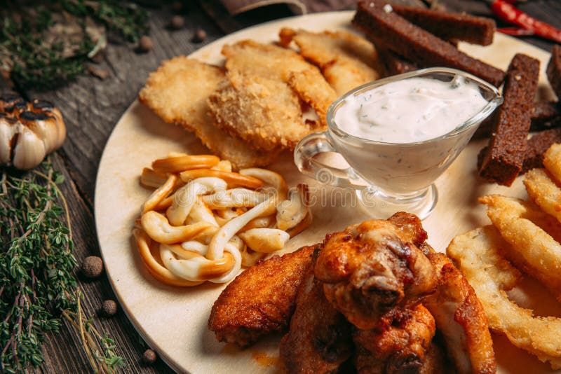 Closeup on Beer Snacks Set on the Board Stock Photo - Image of ketchup ...