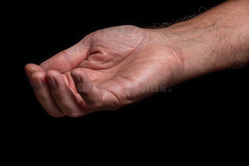 Closeup of a Begging Hand Gesture on a Black Background Stock Image ...