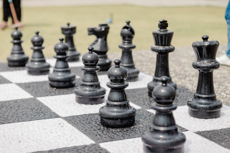 Closeup of Big Chess Figurines on a Board in a Park on a Sunny Day ...