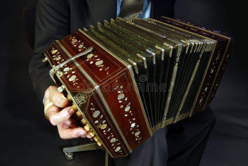 A Closeup of a Black Bandoneon in the Process of Playing Stock Photo ...