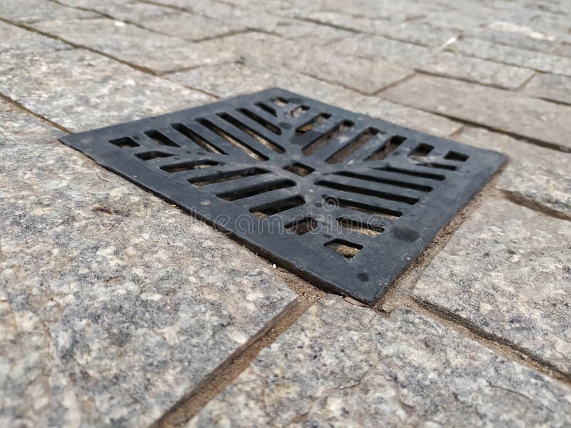 Closeup of a Black Drain on the Granite Floor. Stock Photo - Image of ...