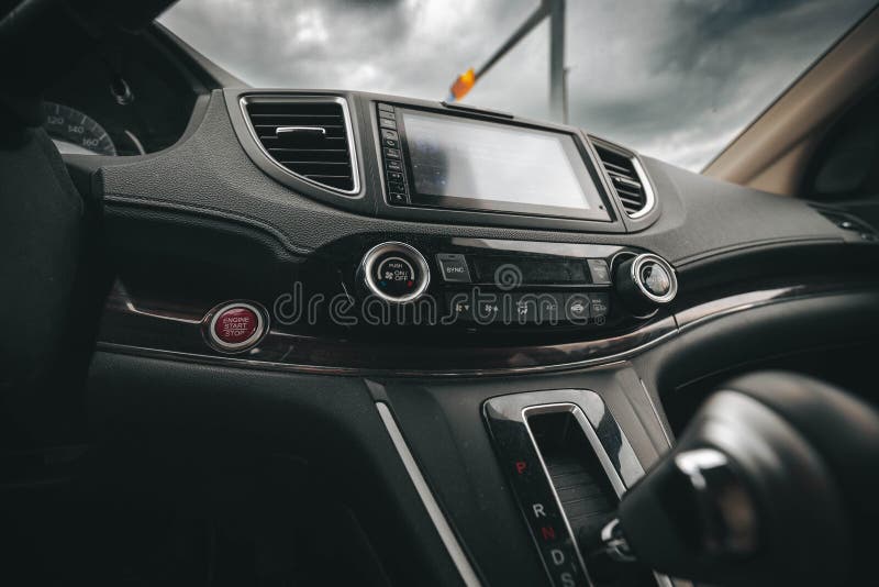 Closeup of Black Interior of a Vehicle Showing Red Push To Start Button ...